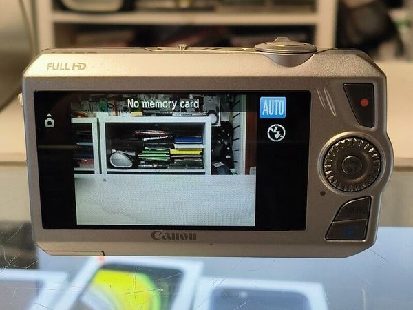 Canon IXUS 1000 HS Digital Camera (High Sensitivity 10 Megapixel, 10x ...