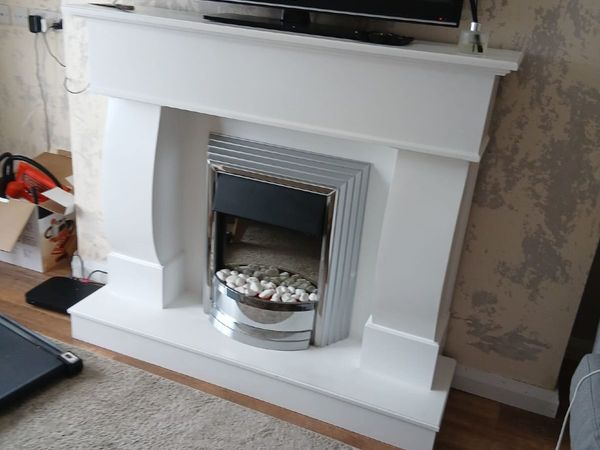White surround fireplace and electric fire for sale in Derry for £180 ...